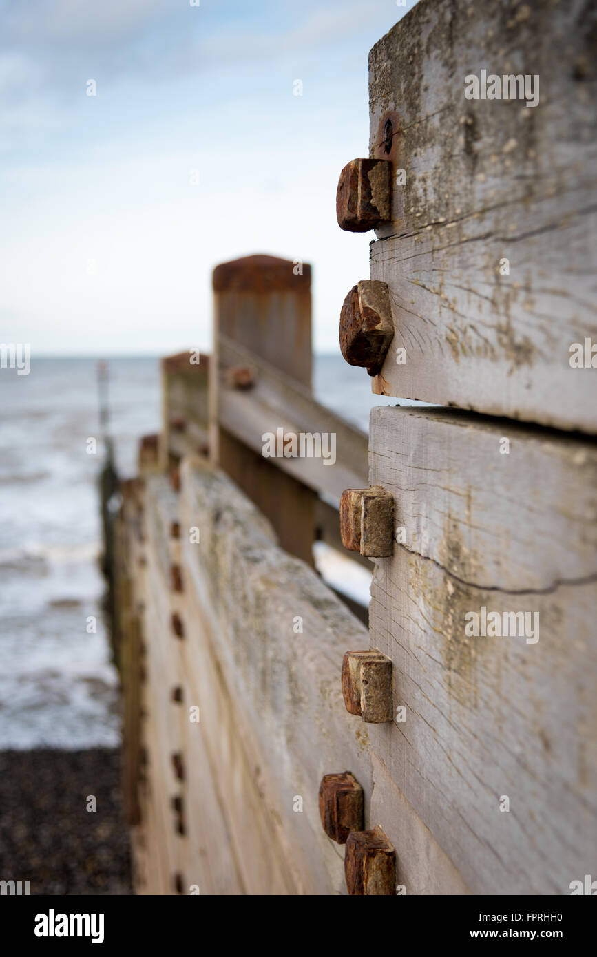 Wooden groynes and seawall hi-res stock photography and images - Alamy