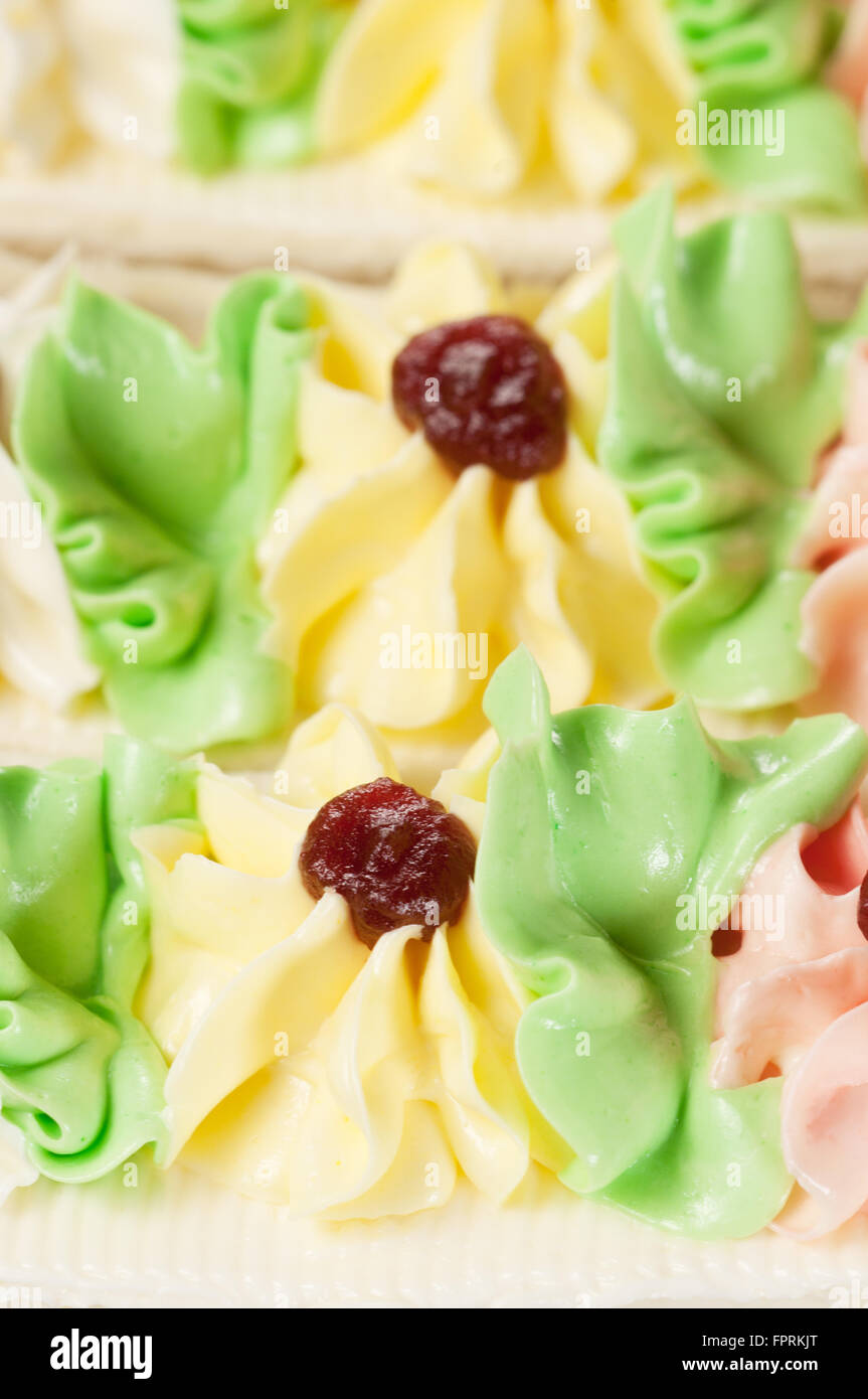 Angel cake with cream flowers, close up Stock Photo - Alamy