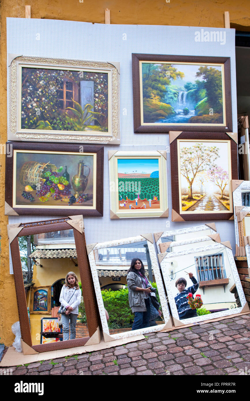 A mirror and pictures in a street in Embu das Artes, Brazil Stock Photo ...