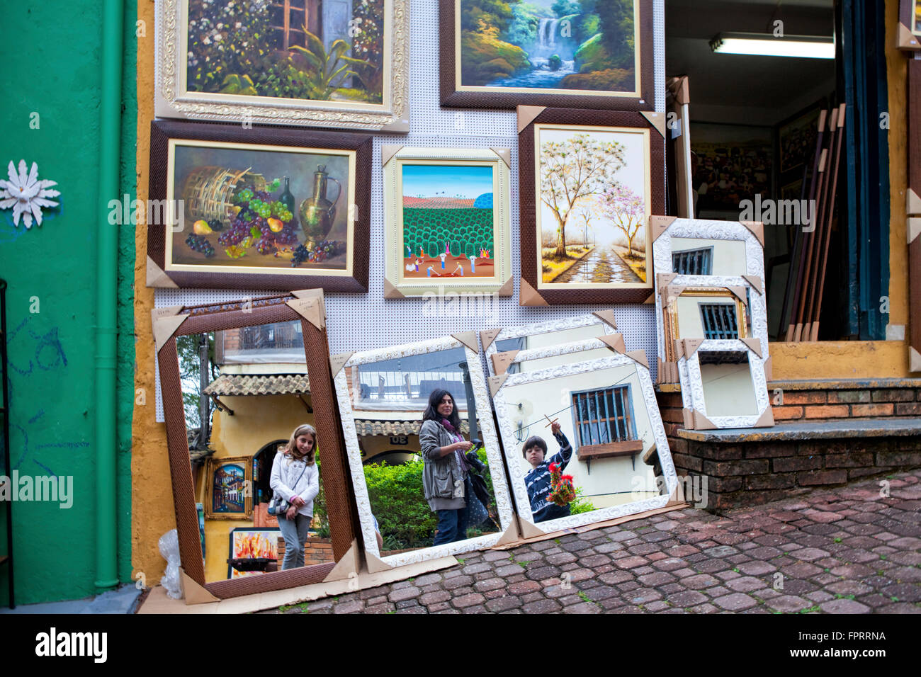 A mirror and pictures in a street in Embu das Artes, Brazil Stock Photo ...