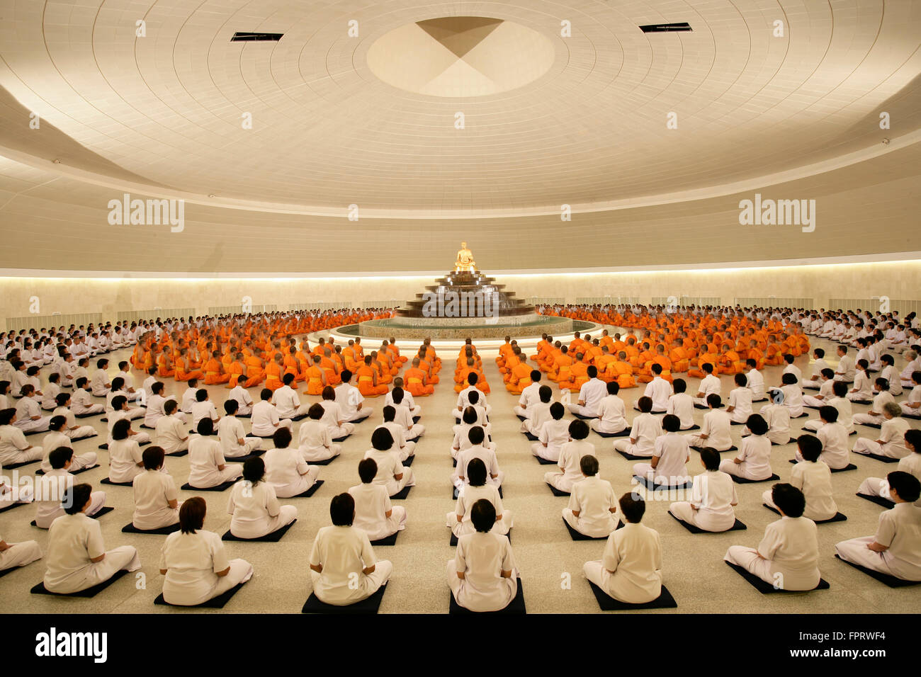 Monks meditating in the Phramonkolthepmuni meditation hall, Phra ...