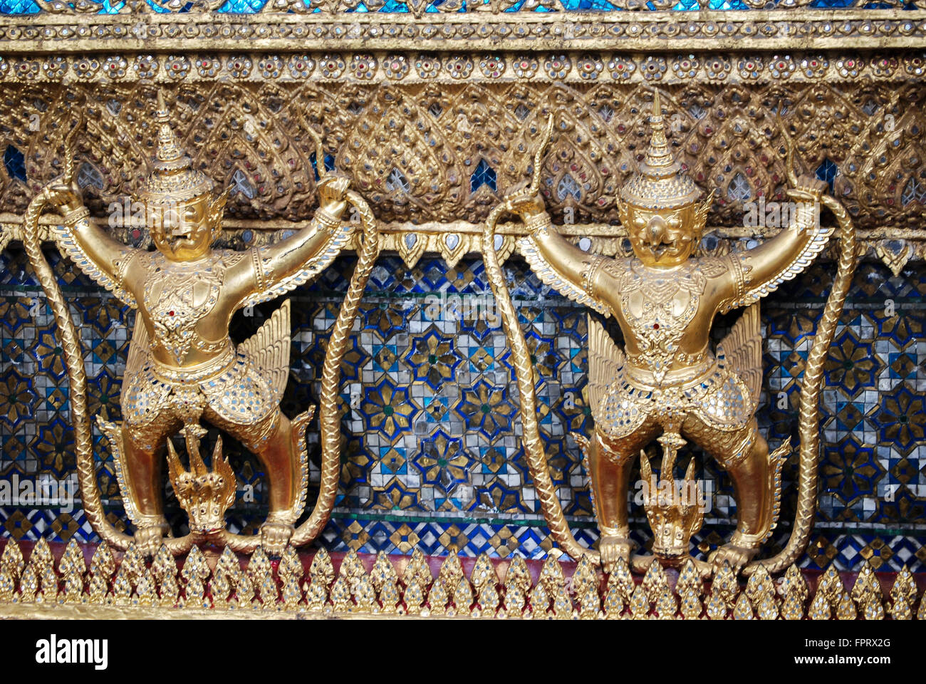 Mythical beasts at the King's Palace in Bangkok, Thailand. The Palace ...