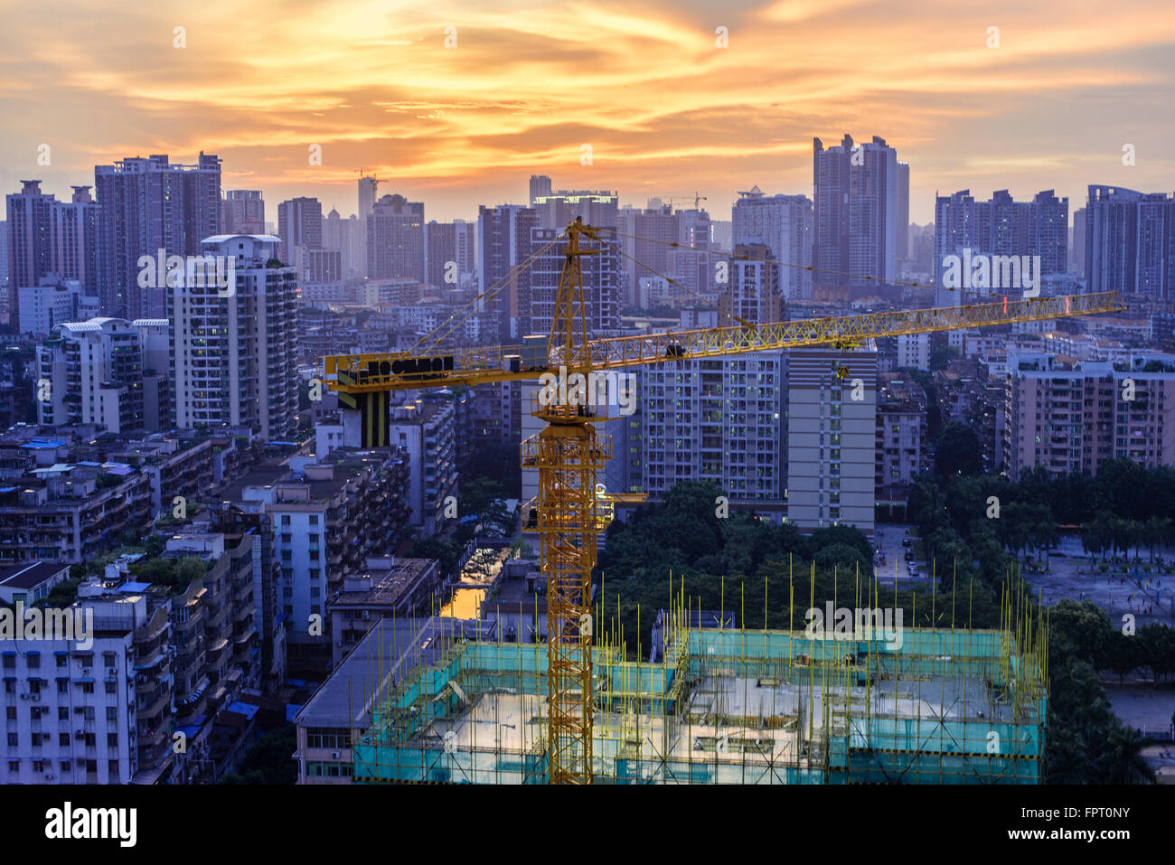 flaming cloud at night and underconstructing building in Guangzhou ...