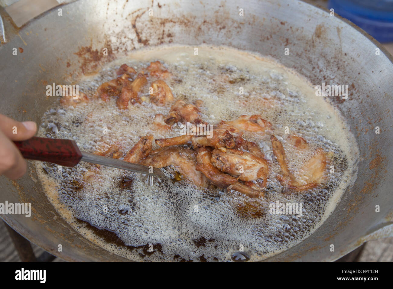 Frying in oil hi-res stock photography and images - Alamy