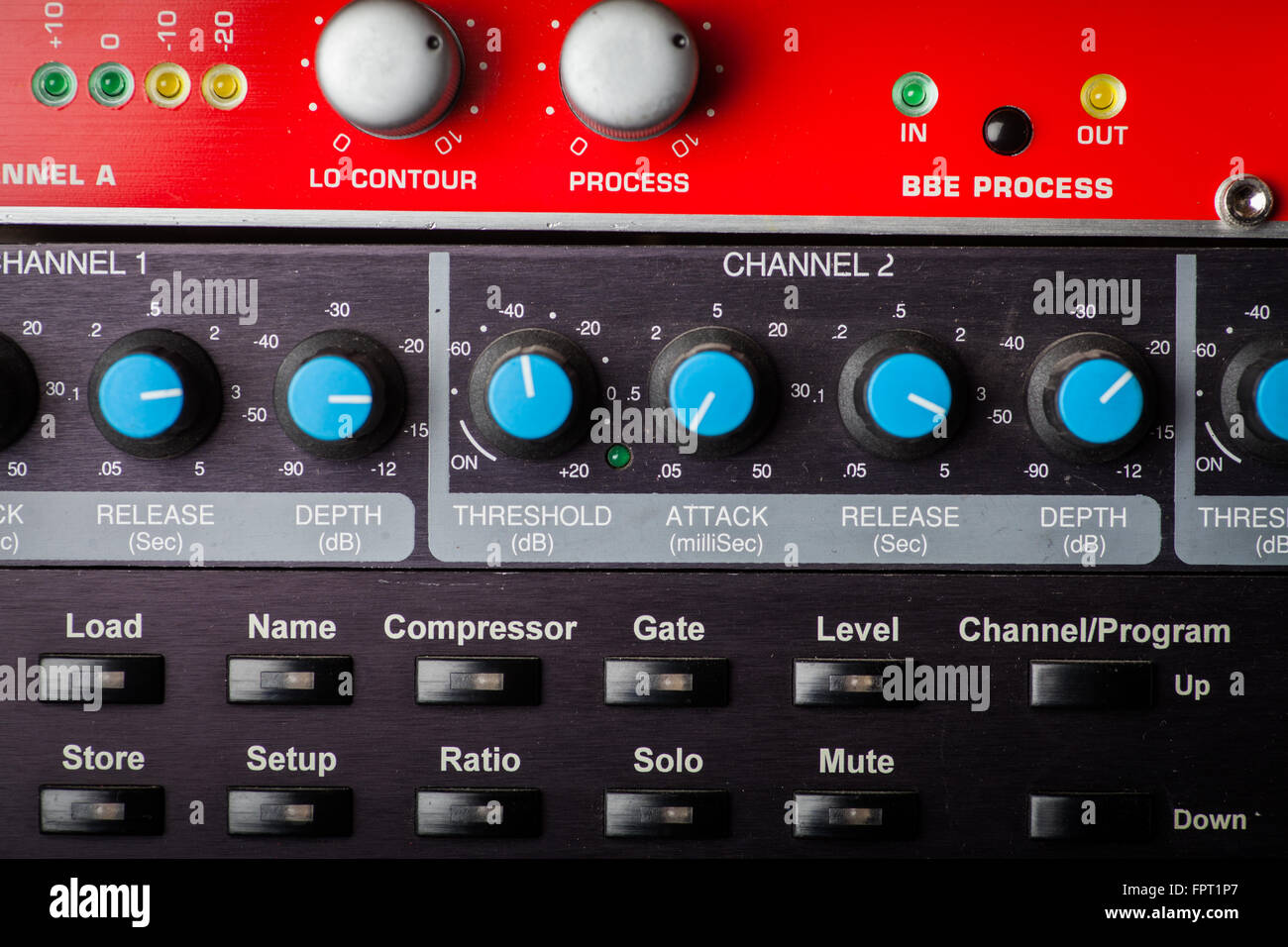 Color image of many buttons on a sound mixer in a recording studio ...
