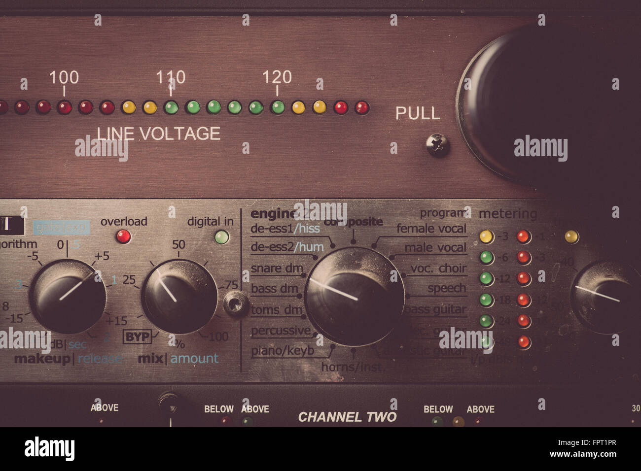 Color image of many buttons on a sound mixer in a recording studio ...