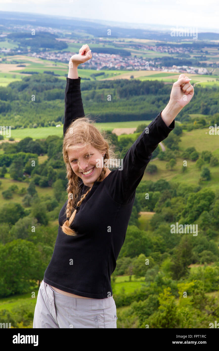 Happy woman feeling good Stock Photo - Alamy
