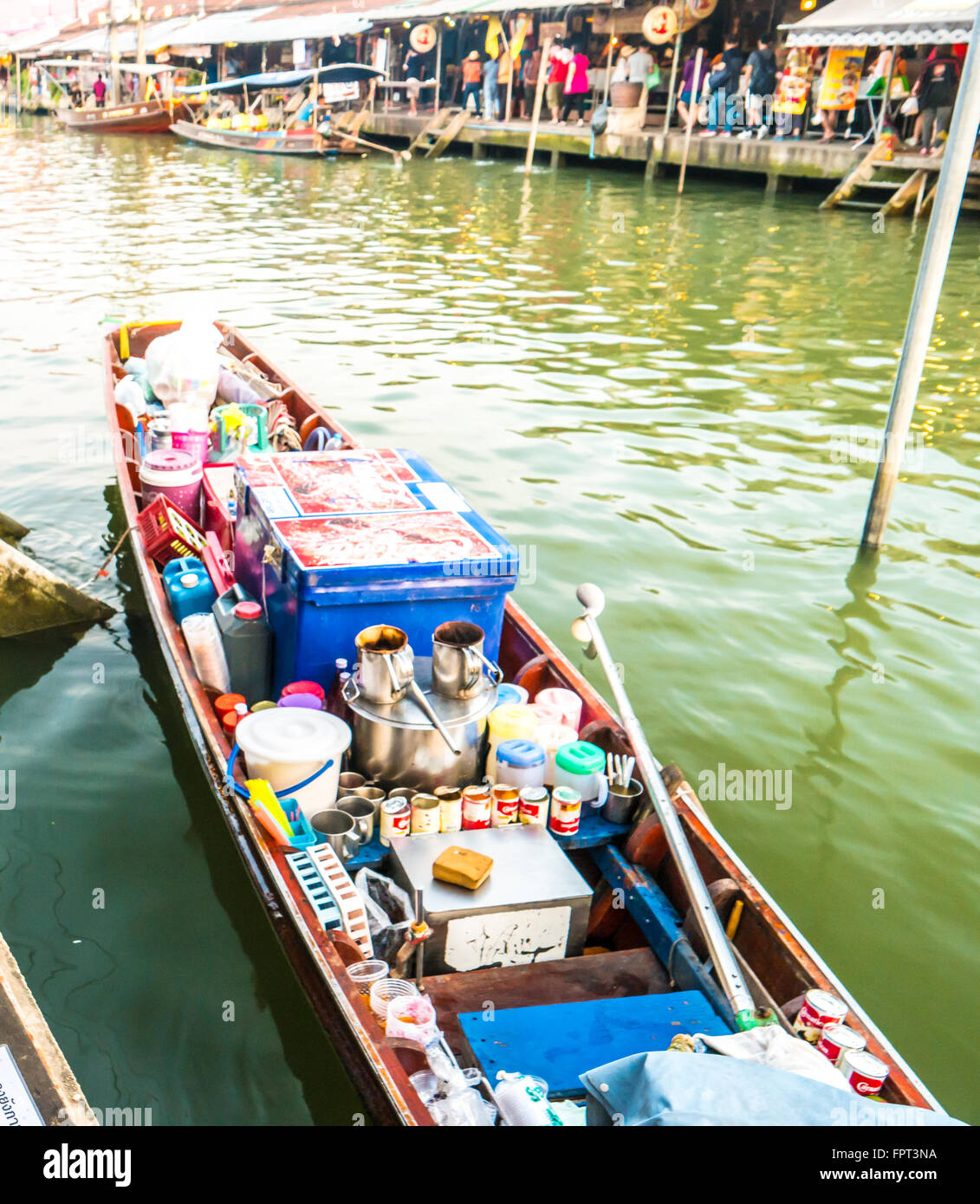 Trader's boats in a floating market in Thailand Stock Photo - Alamy