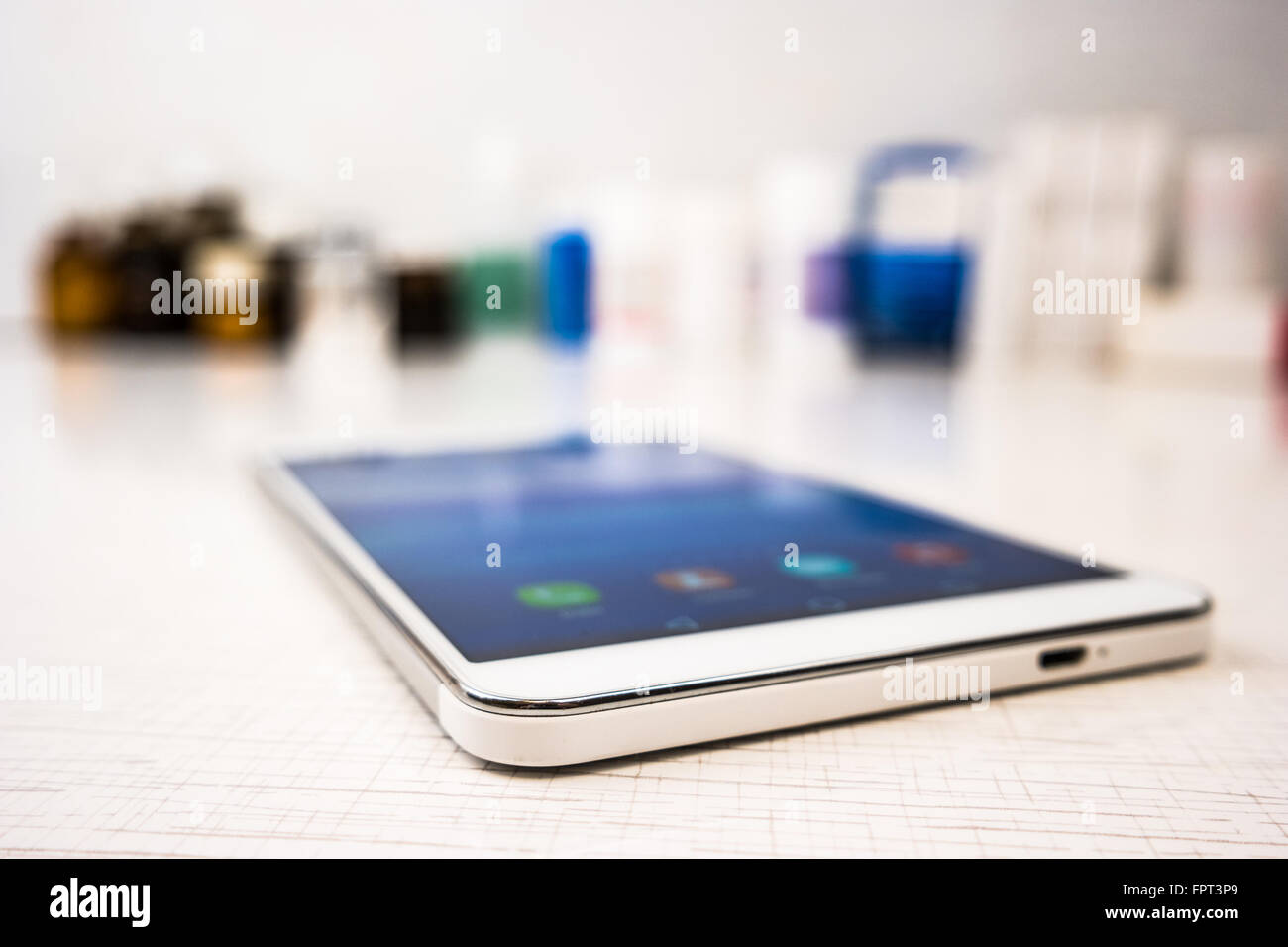 Tablet pc with medical objects Stock Photo - Alamy