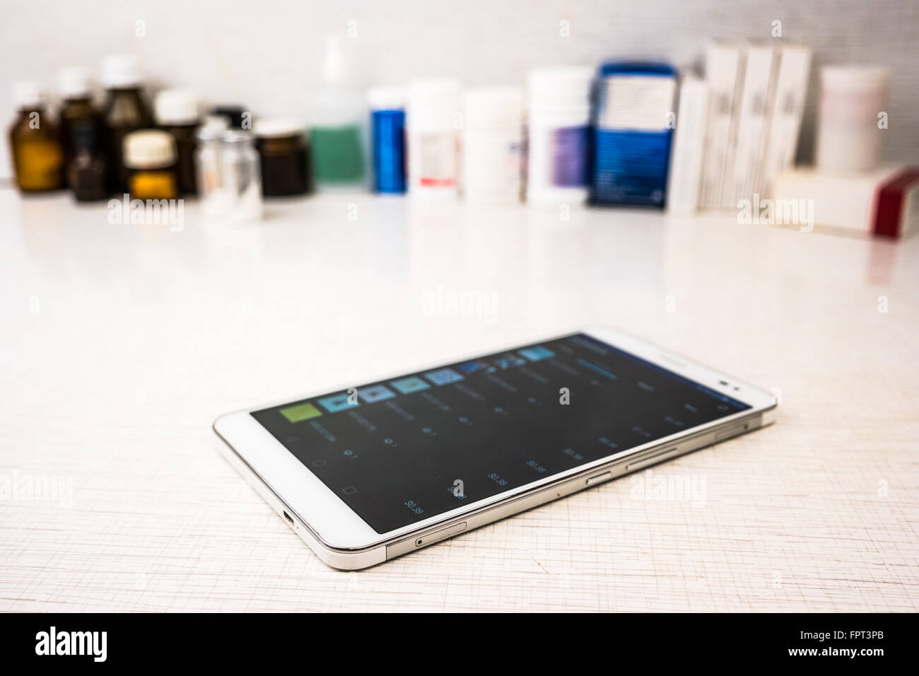 Tablet pc with medical objects Stock Photo - Alamy