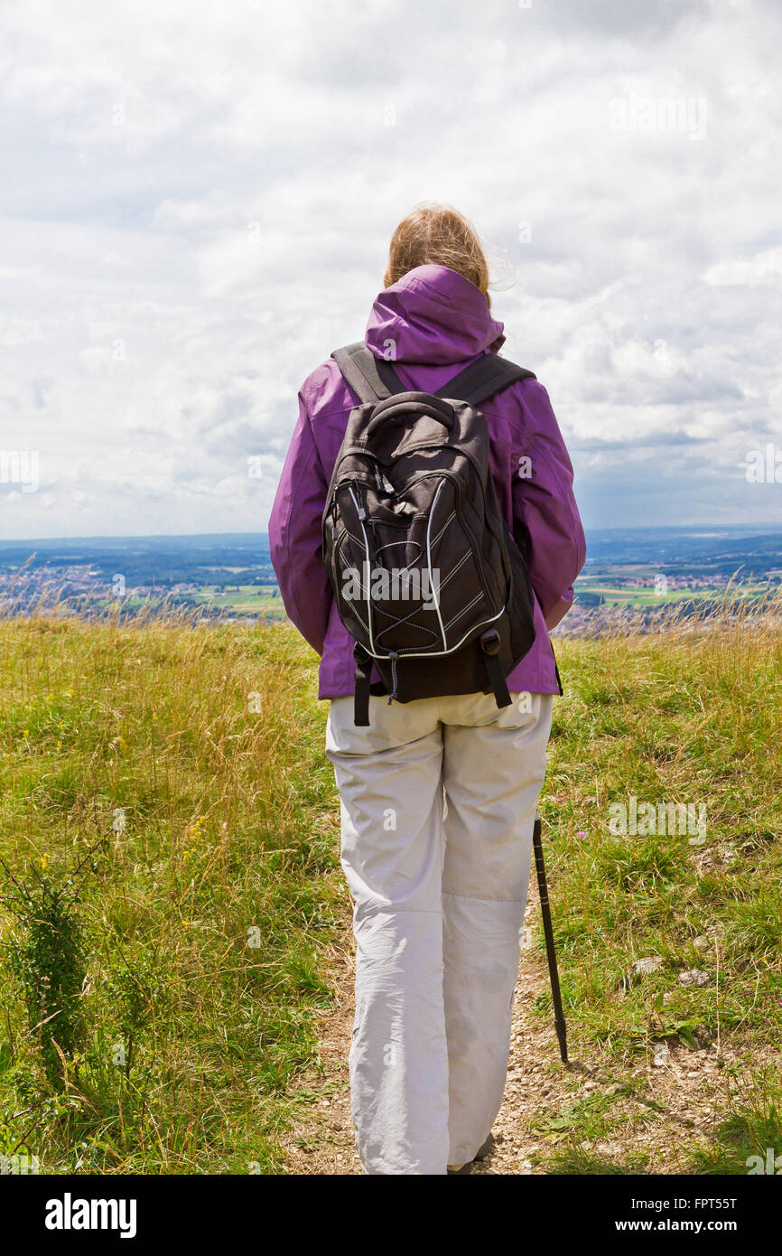Young woman hiking in nature Stock Photo - Alamy