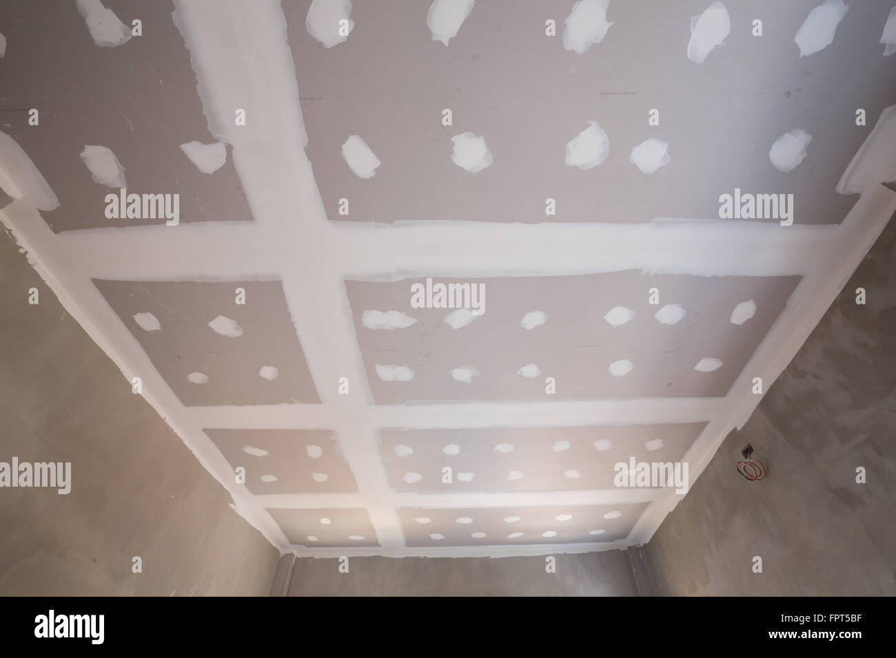 gypsum board ceiling of house at construction site Stock Photo - Alamy