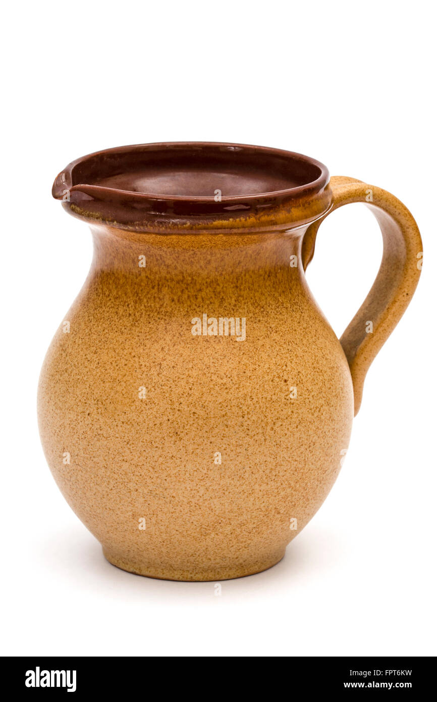 Old pitcher, isolated on white background Stock Photo - Alamy