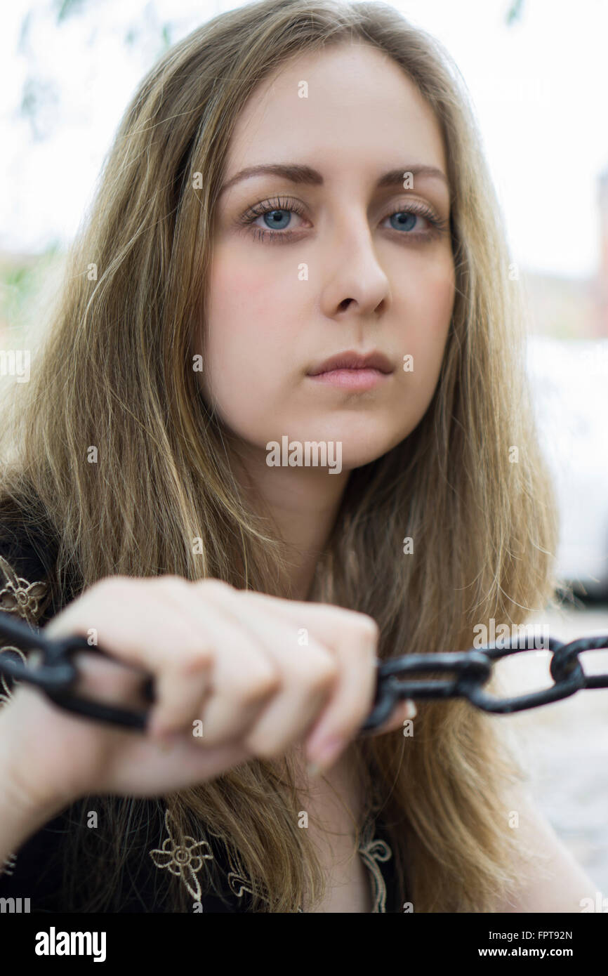 Holding chains hi-res stock photography and images - Alamy