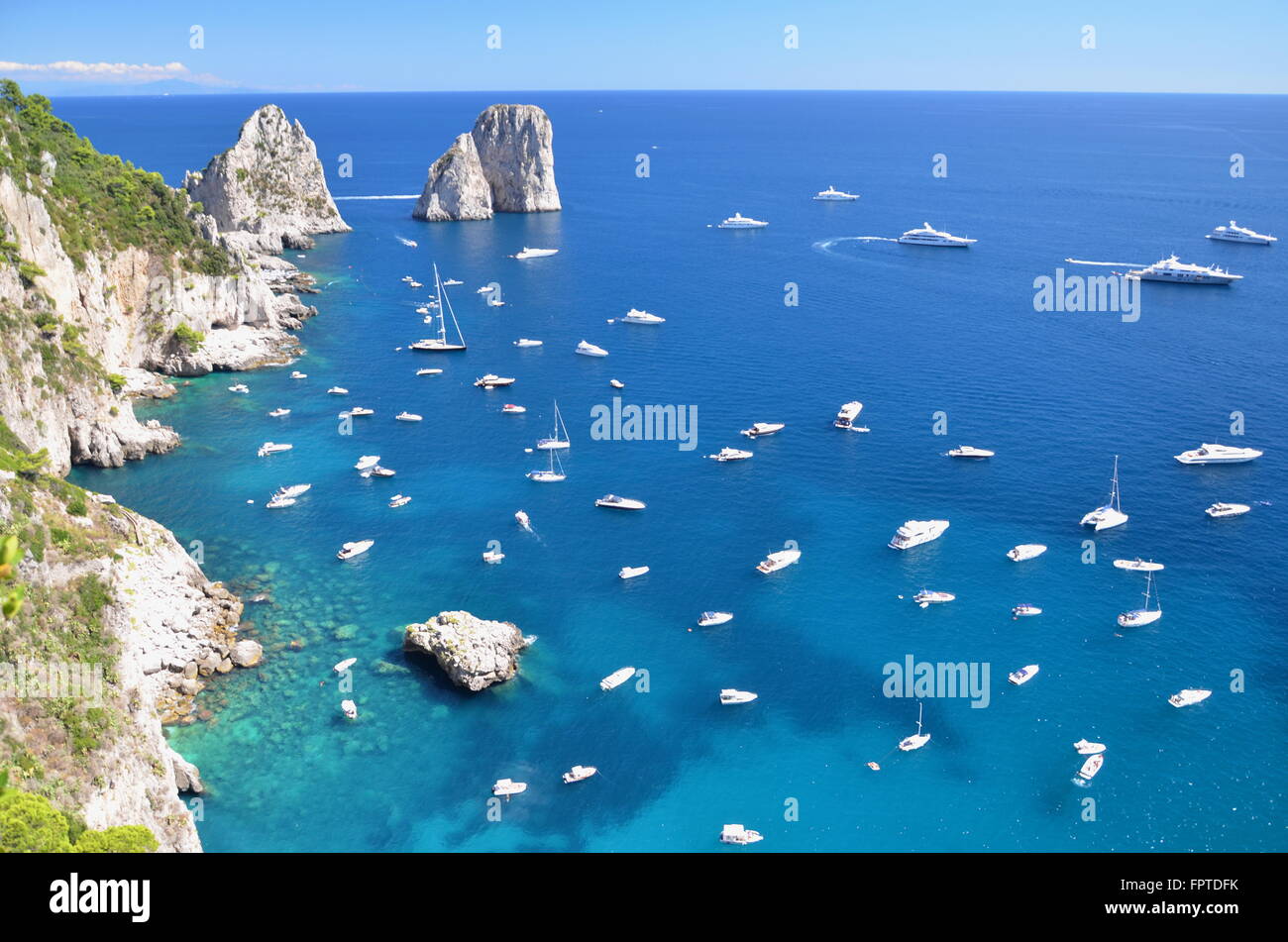 Gorgeous landscape of famous faraglioni rocks on Capri island, Italy ...