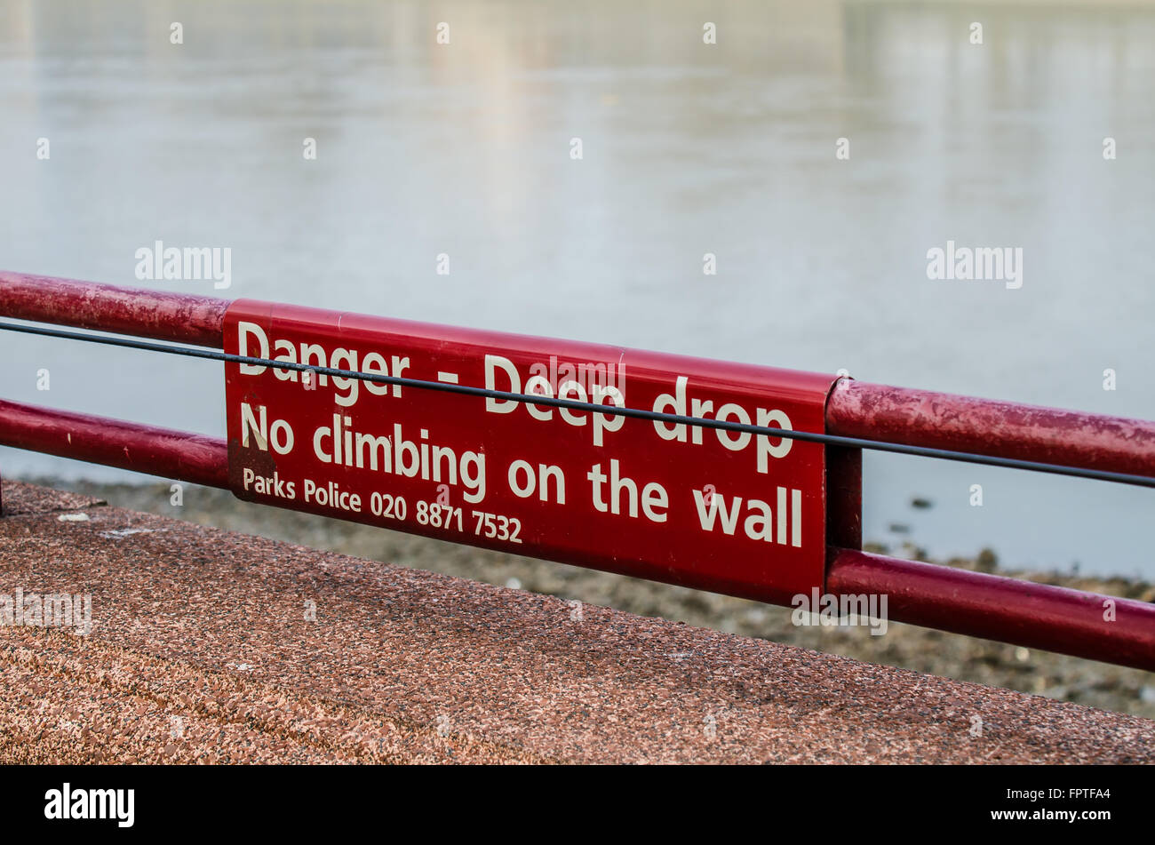 Danger - Deep drop sign on the Thames at Battersea Park Stock Photo - Alamy