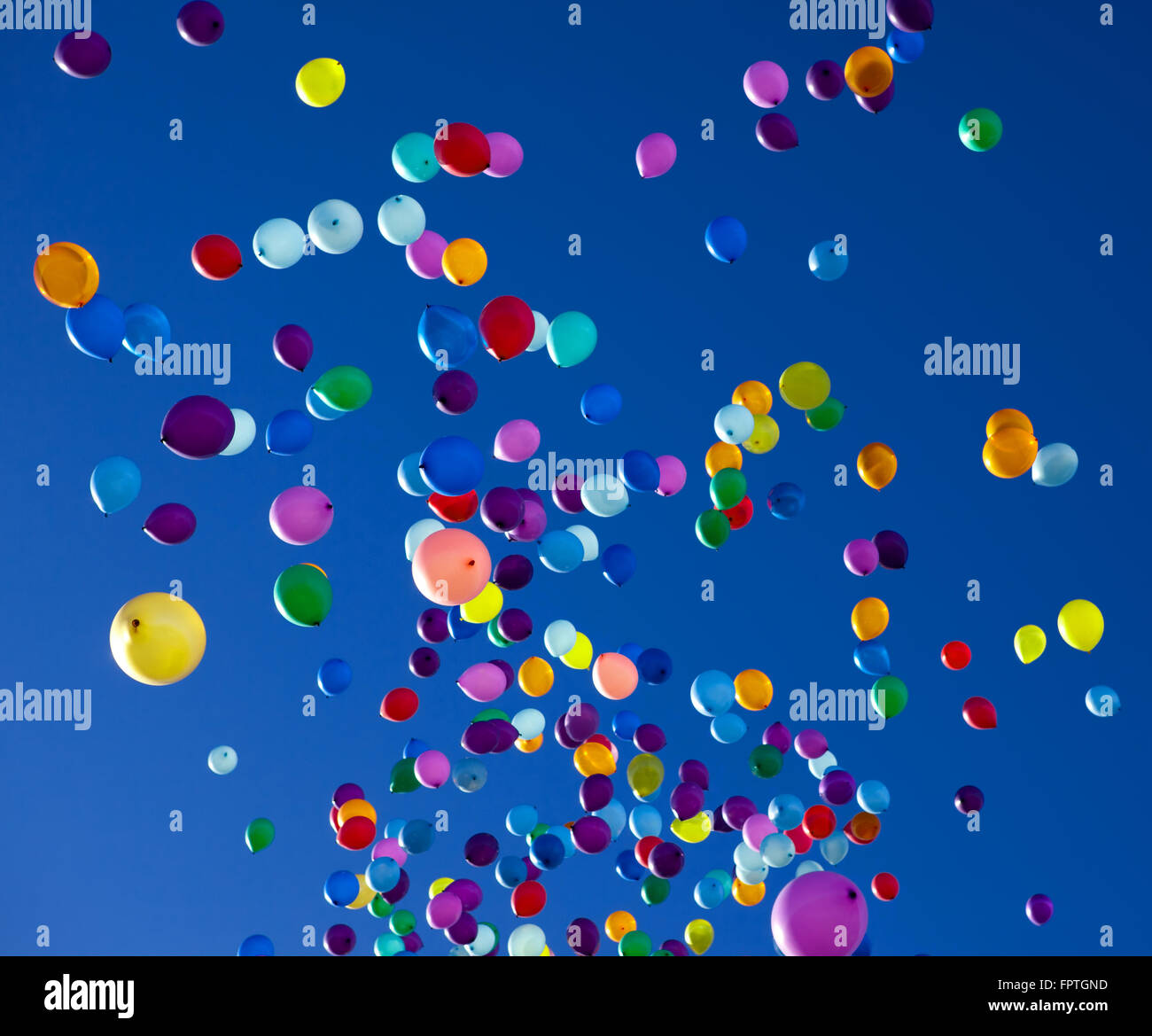 Colorful Balloons flying in the sky party Stock Photo - Alamy