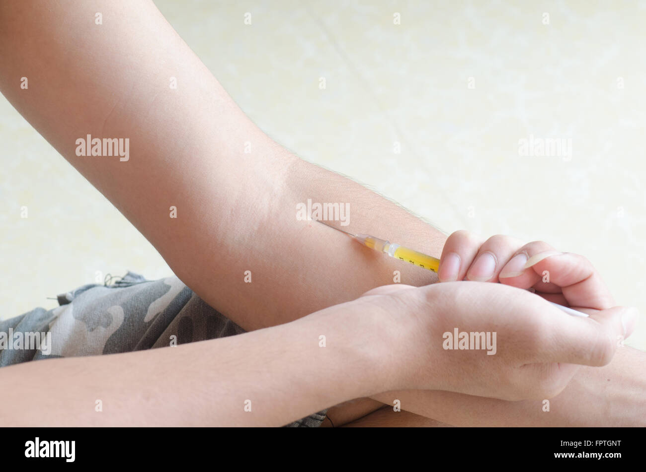 drug addict man with syringe in action Stock Photo - Alamy