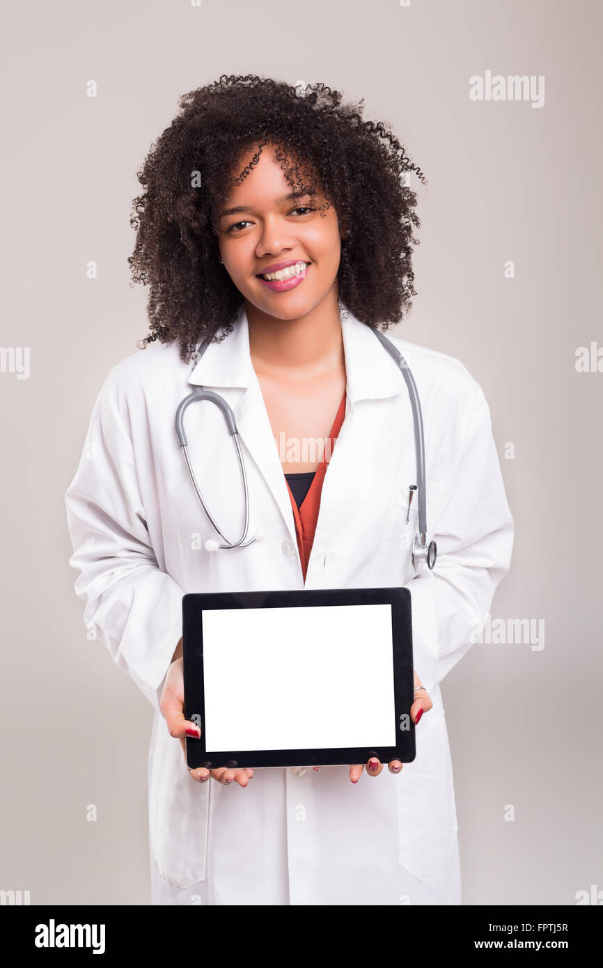 Studio shot of a beautiful african doctor Stock Photo - Alamy