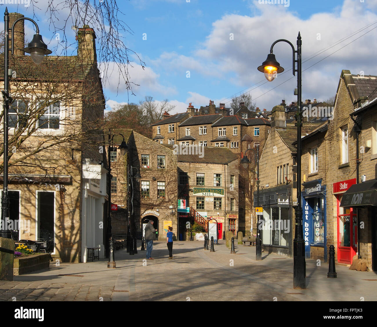 Street scene in Hebden Bridge, West Yorkshire, showing local cafes ...