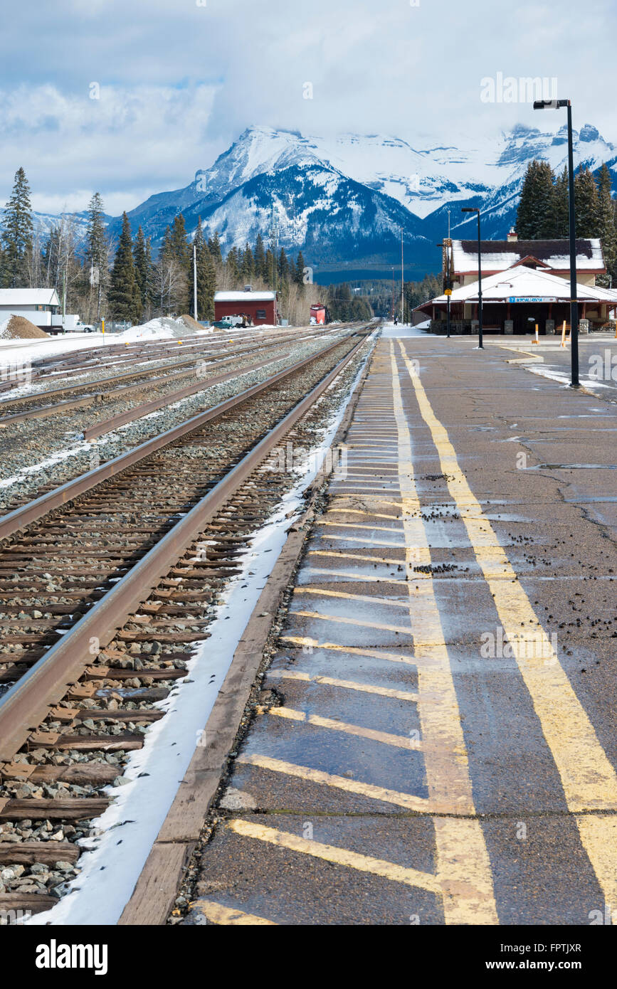 Banff Railway station Canada with views of the Rocky Mountains in the ...