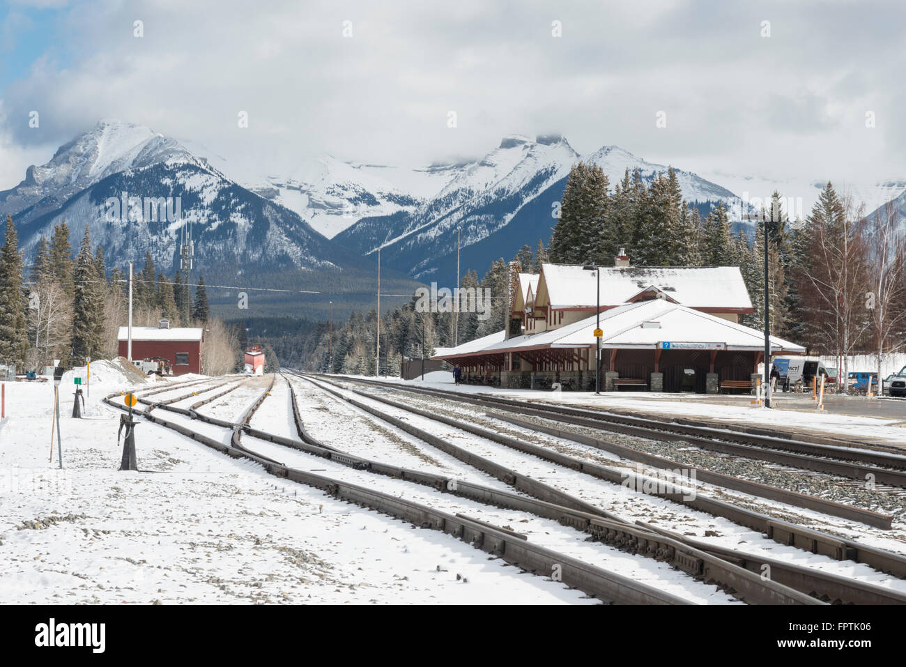 Banff Railway station Canada with views of the Rocky Mountains in the ...