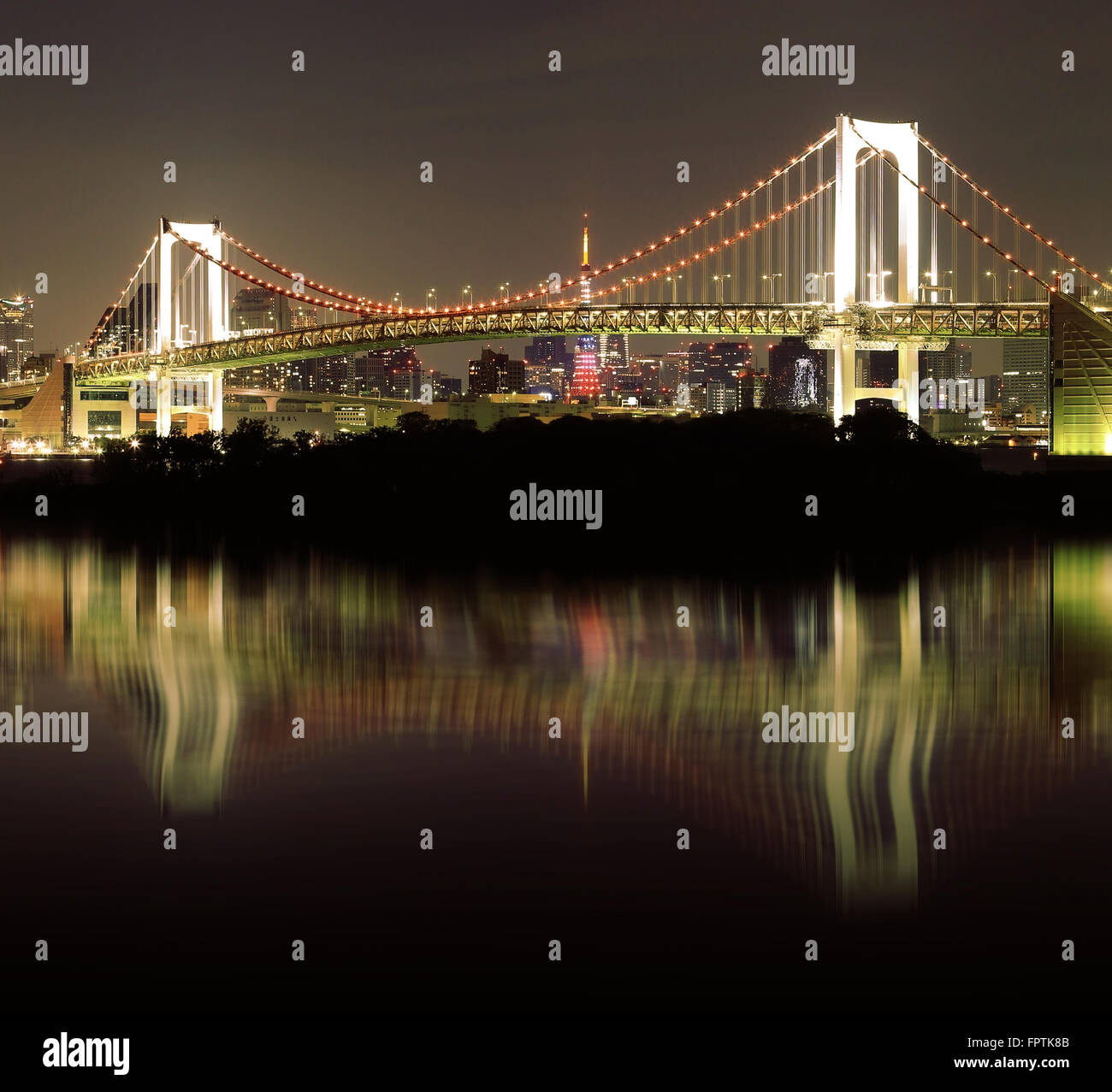 Tokyo Rainbow Bridge with mirror reflection at Night, Odaiba, Japan ...