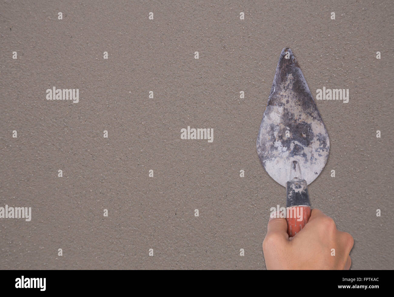 hand of builder worker use trowel plastering concrete at wall Stock ...