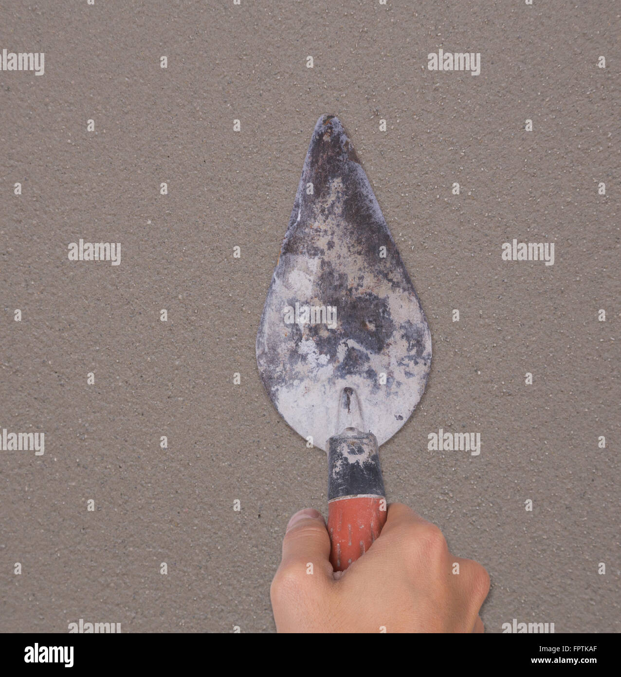 hand of builder worker use trowel plastering concrete at wall Stock ...