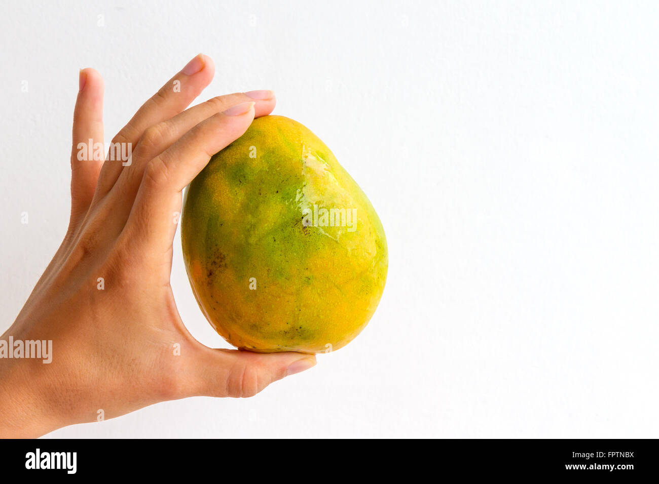 Hand mango hi-res stock photography and images - Alamy