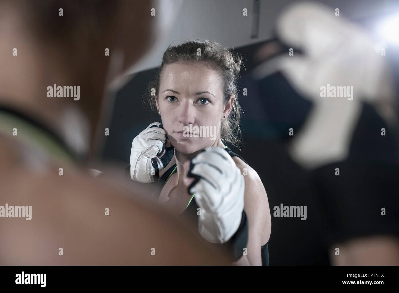 Two sportswomen exercising together boxing, Bavaria, Germany Stock ...