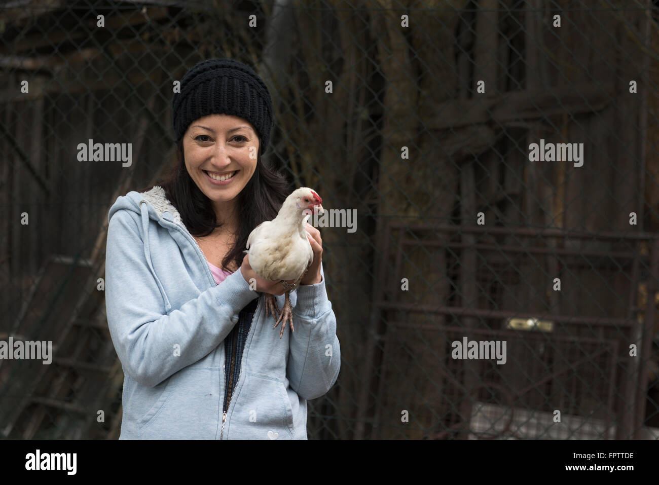 Woman chicken looking at camera hi-res stock photography and images - Alamy