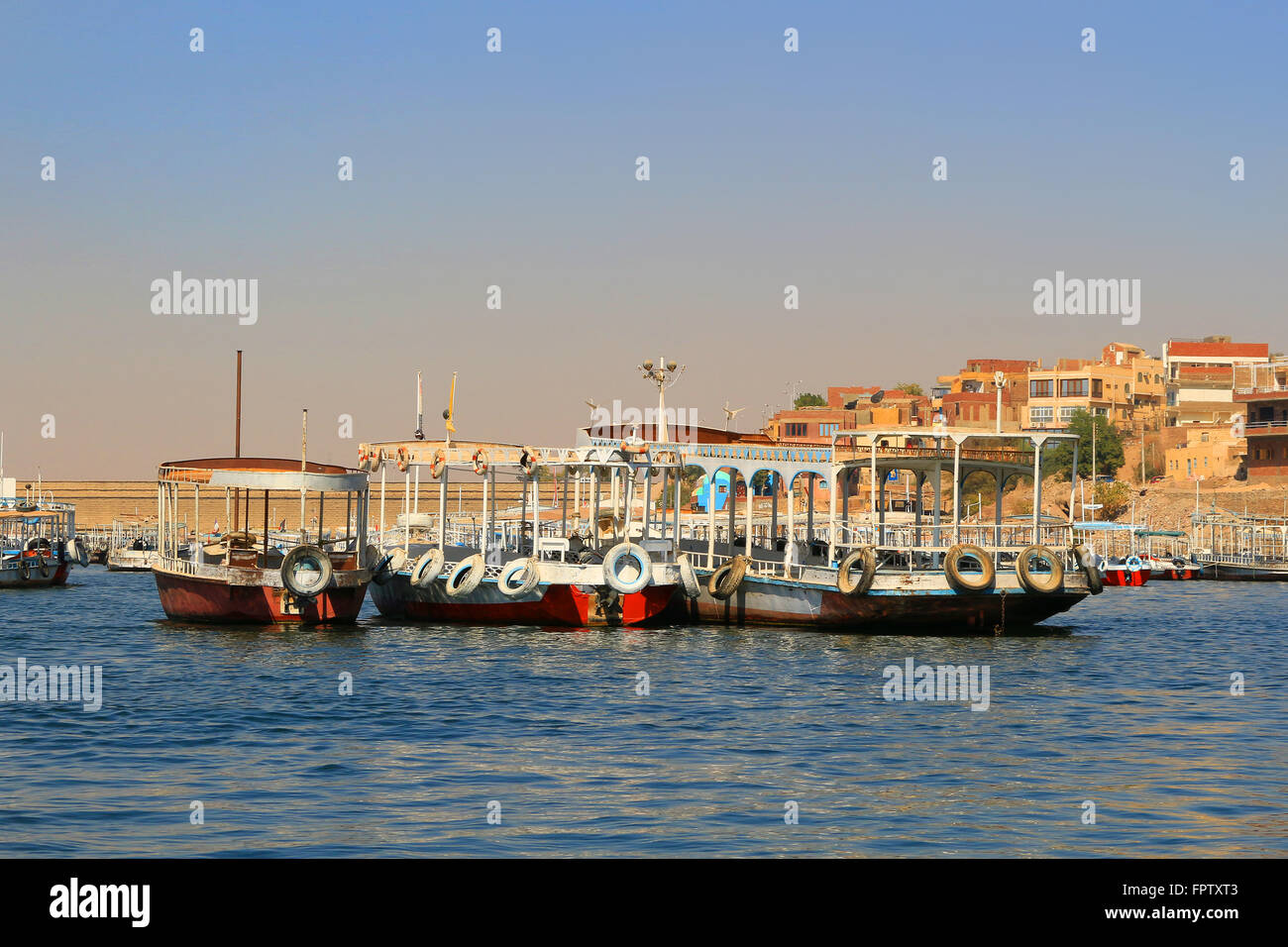 Wooden boats docked along the Nile River in Egypt, North Africa with ...