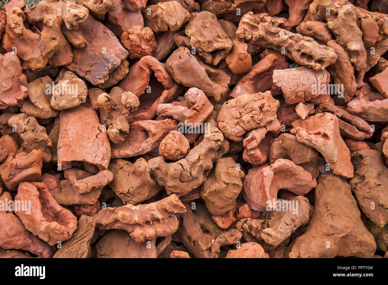 Great bunch of parts and shapes baked clay on the mound Stock Photo - Alamy