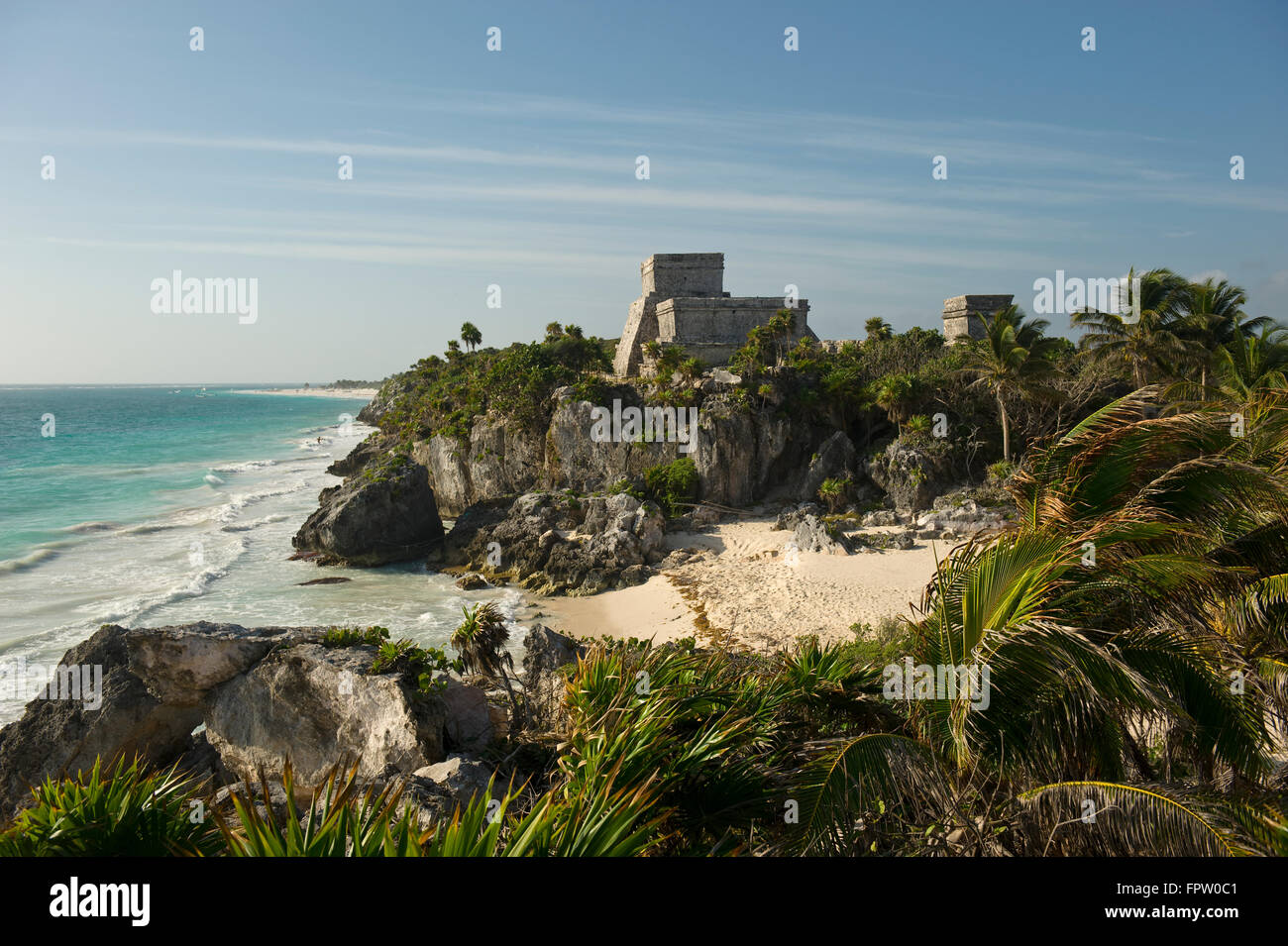 The ruins of Tulum, Mexico with sand beach and blue ocean below Stock ...