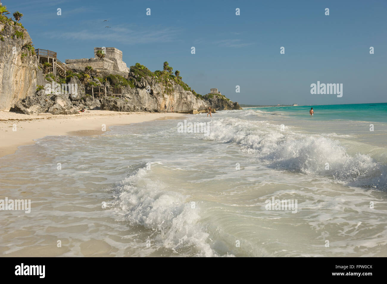 The ruins of Tulum, Mexico with sand beach and blue ocean below Stock ...