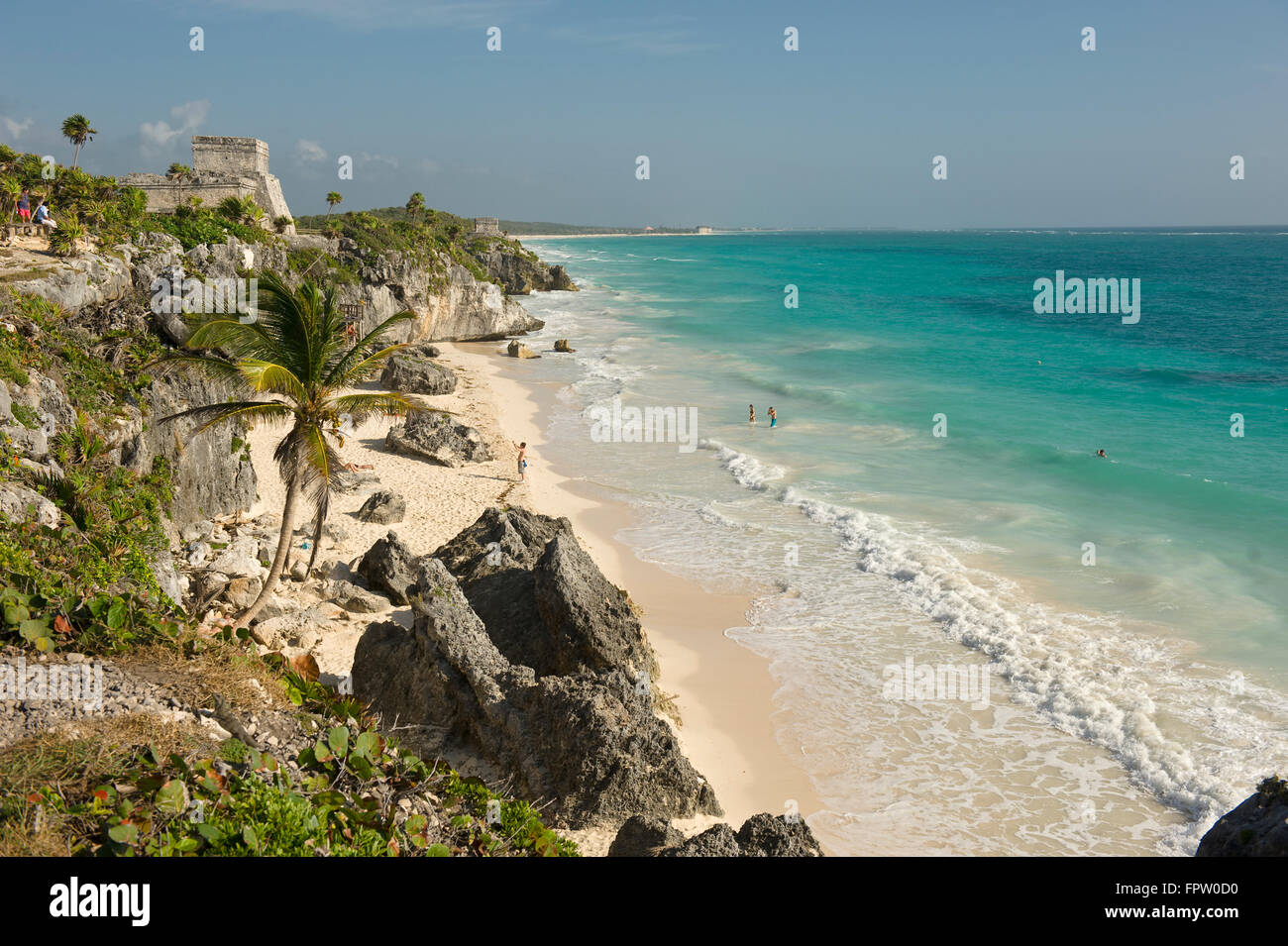 The ruins of Tulum, Mexico with sand beach and blue ocean below Stock ...