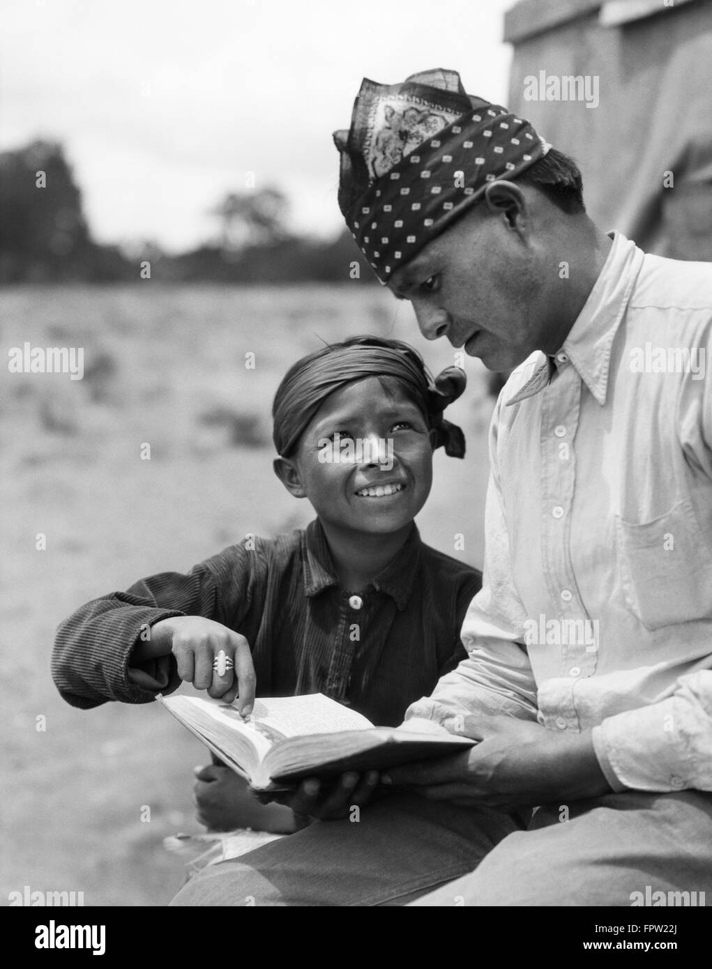 1930s SMILING NATIVE AMERICAN BOY NAVAJO POINTING & READING BOOK WITH ...