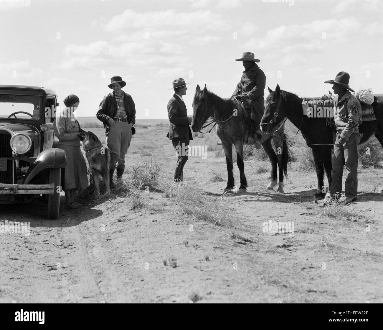 1930s TWO NATIVE AMERICAN NAVAJO INDIAN MEN WITH PONIES STOP TO SPEAK ...