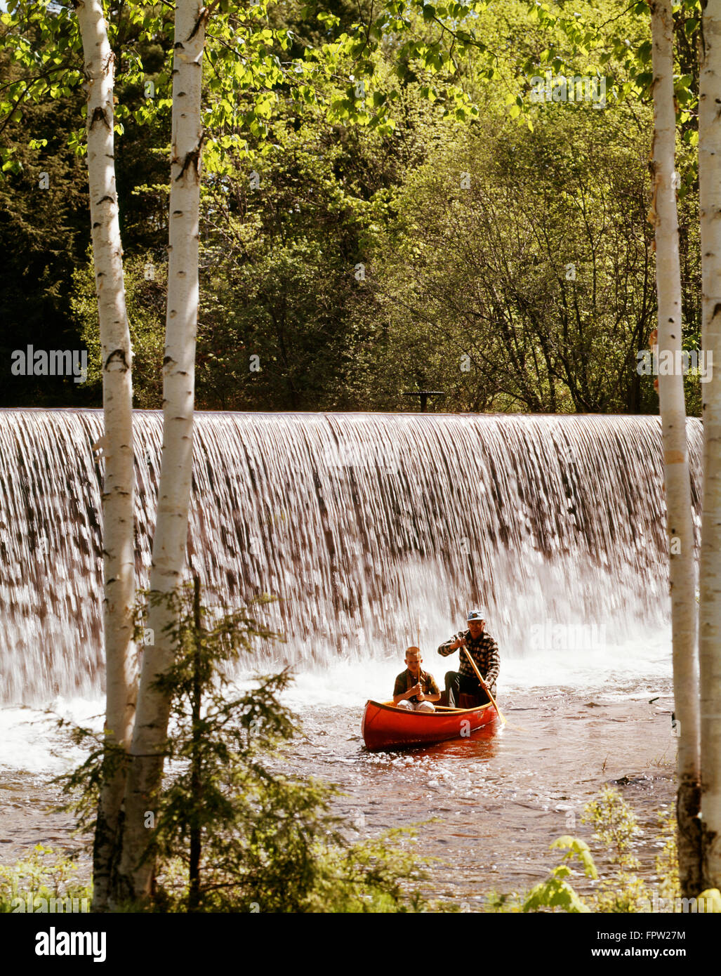 Two boys in canoe leisure hi-res stock photography and images - Alamy