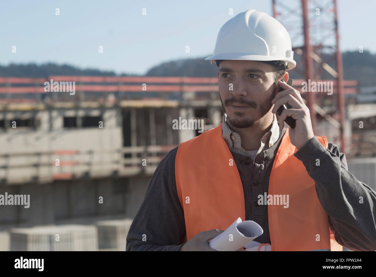 Civil engineer male hard hat phone hi-res stock photography and images ...