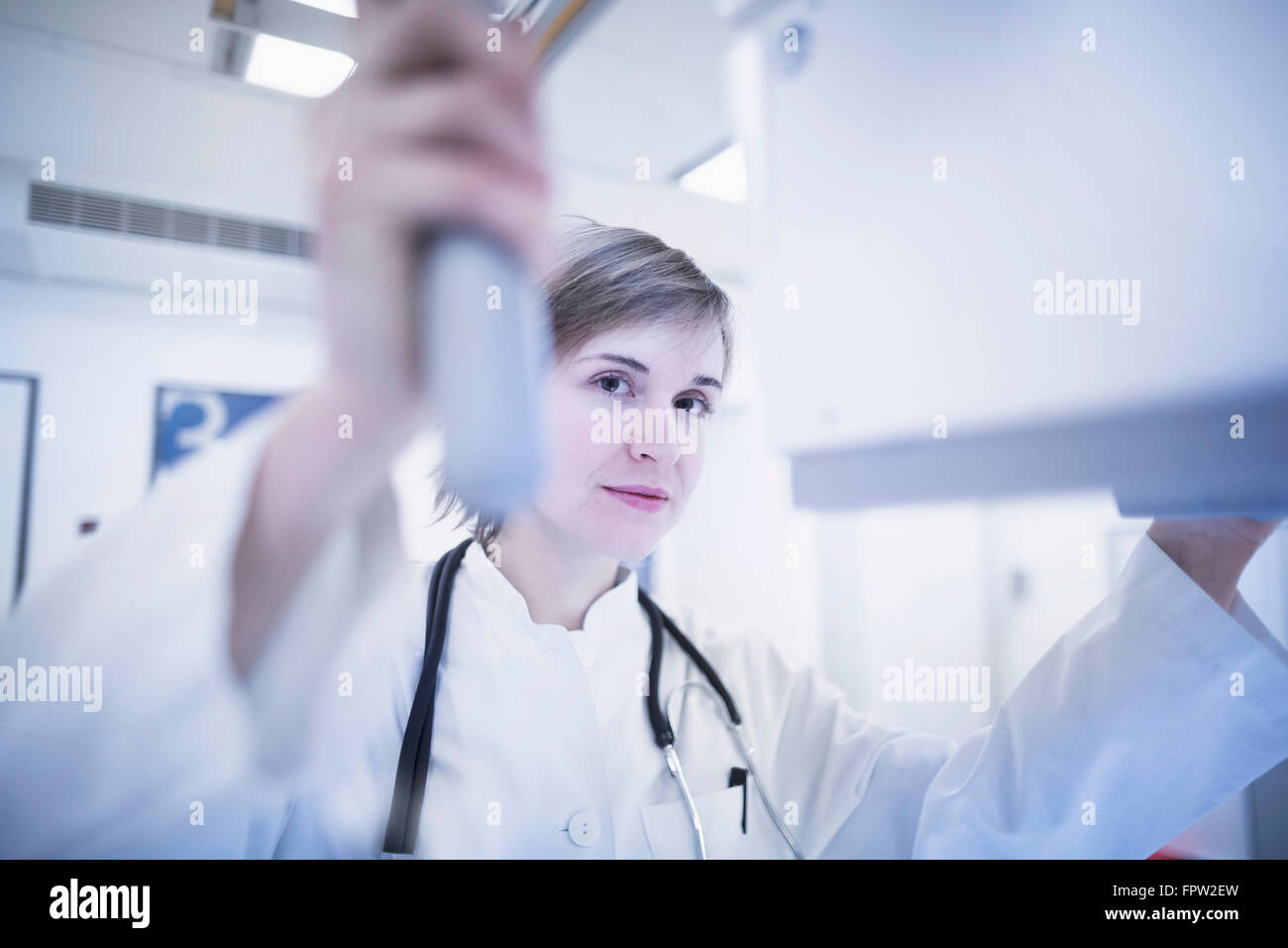 Radiologist Adjusting X Ray Machine High Resolution Stock Photography ...