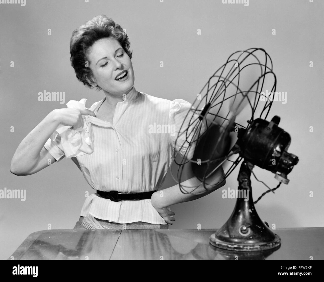 Hot black woman fan hi-res stock photography and images - Alamy
