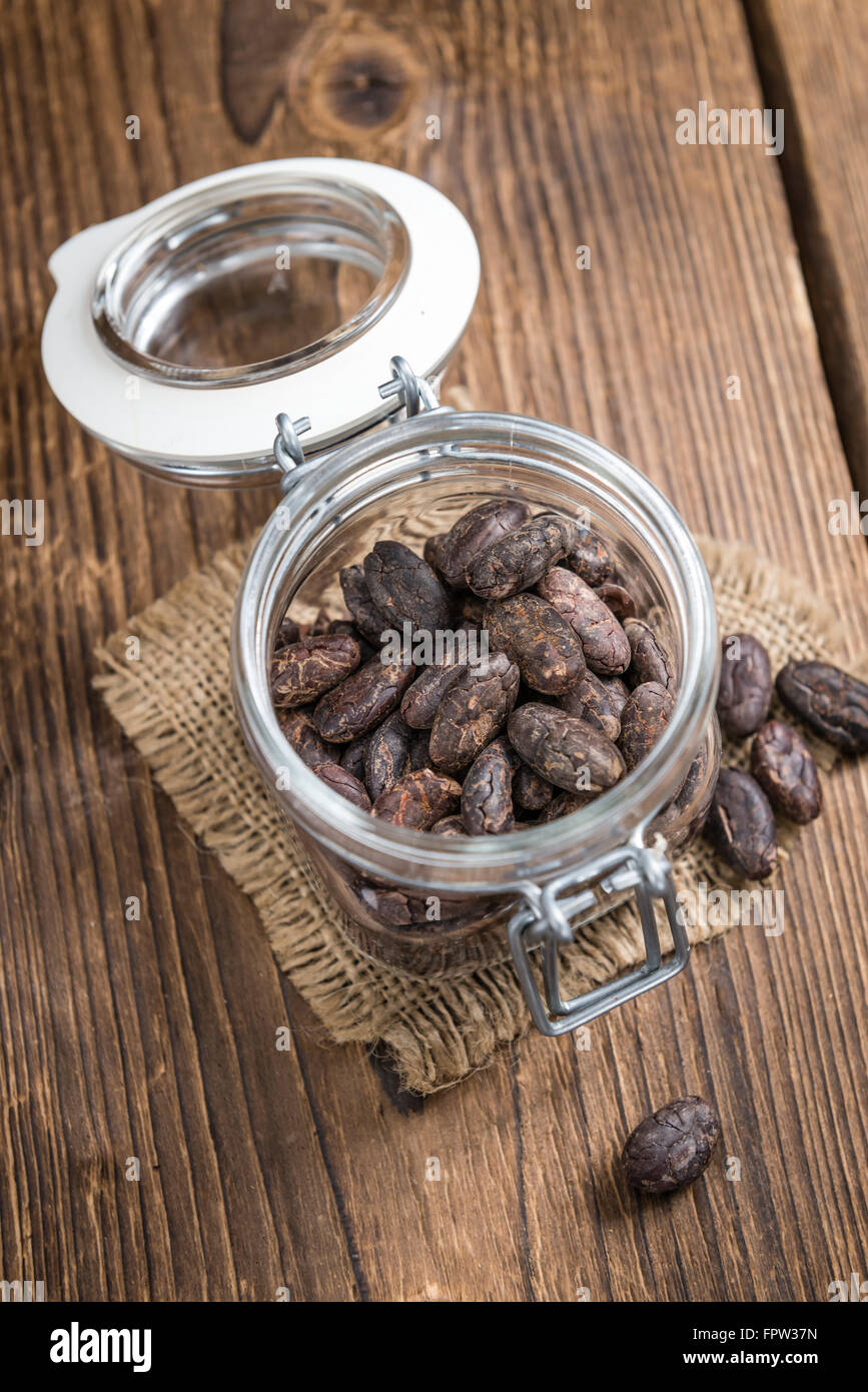 Roasted Cacao Beans (selective focus) on an old wooden table Stock ...