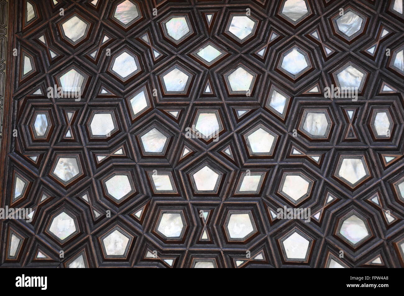 Islamic architecture pattern in pentagon, mirror and filigree window ...