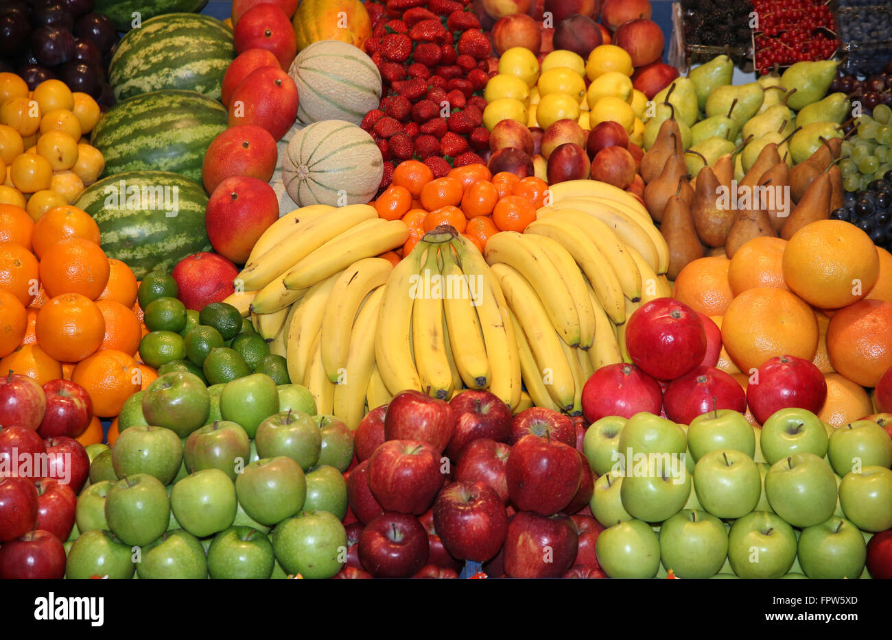 Set of freshly picked organic fruits at market stall. Freshly harvested ...