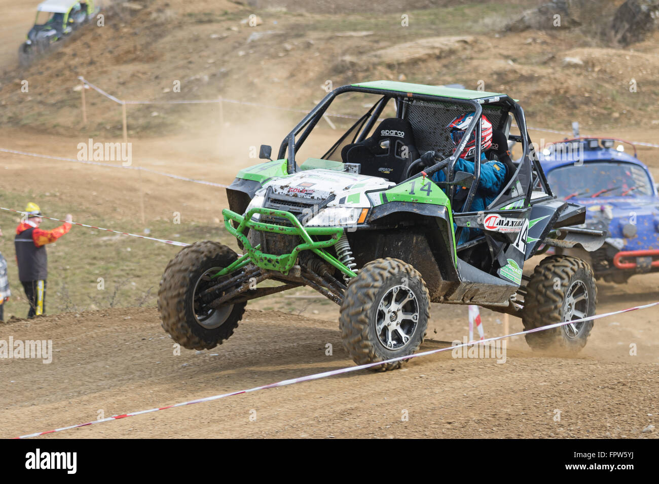 Front view of the green off road car in the race Stock Photo - Alamy