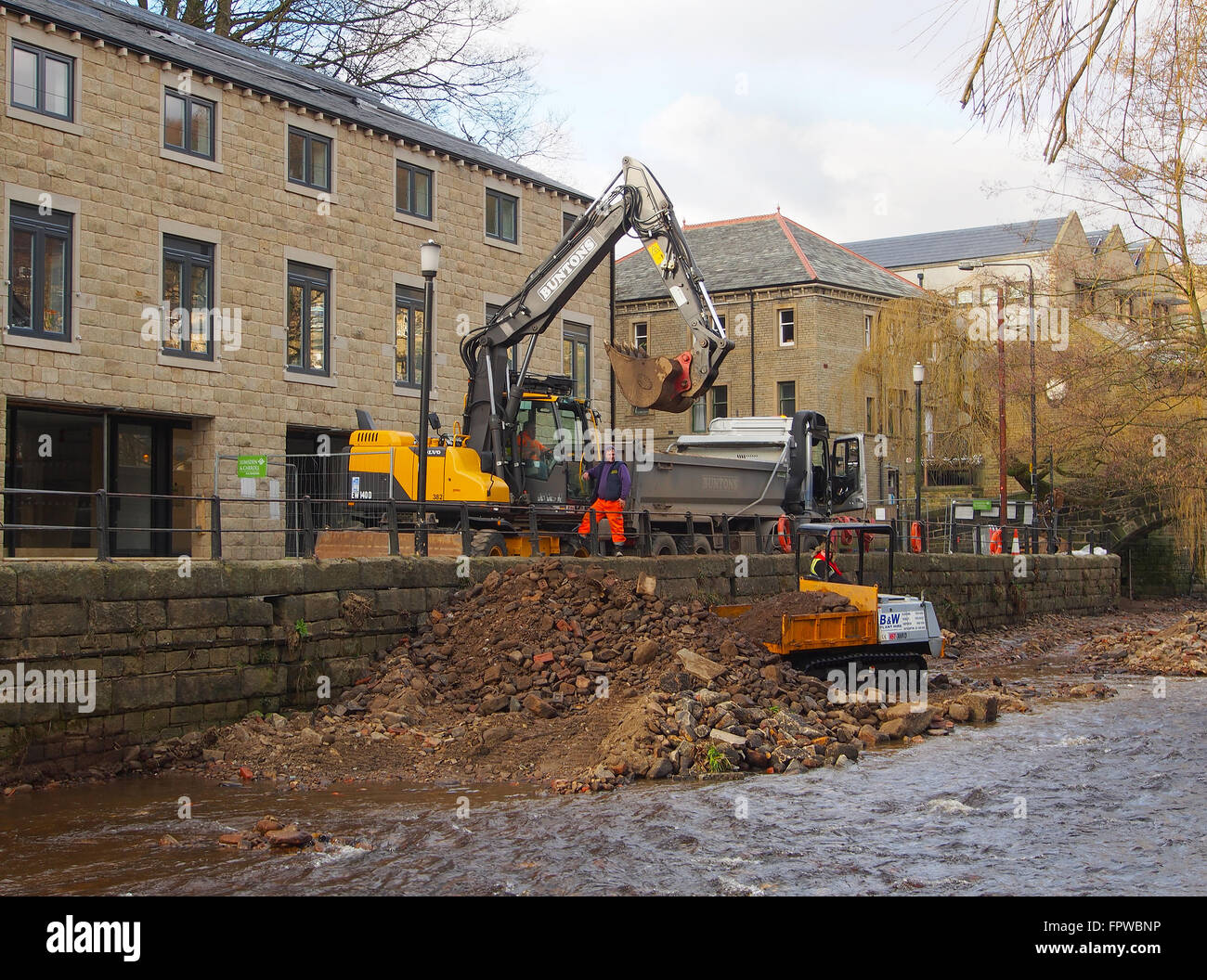 Clearing stones and debris from the floor of the River Calder in Hebden ...