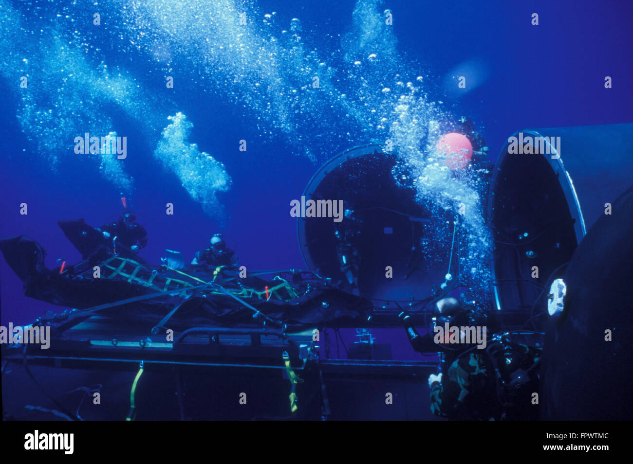 Dry Deck Shelter (DDS) operators, on deck of an underway submarine ...