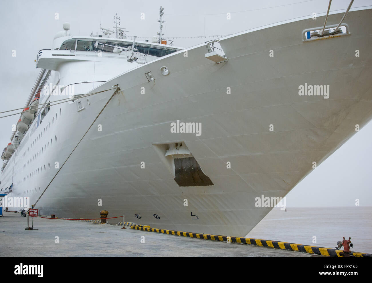 Large cruise ship at dock, low view point Stock Photo - Alamy